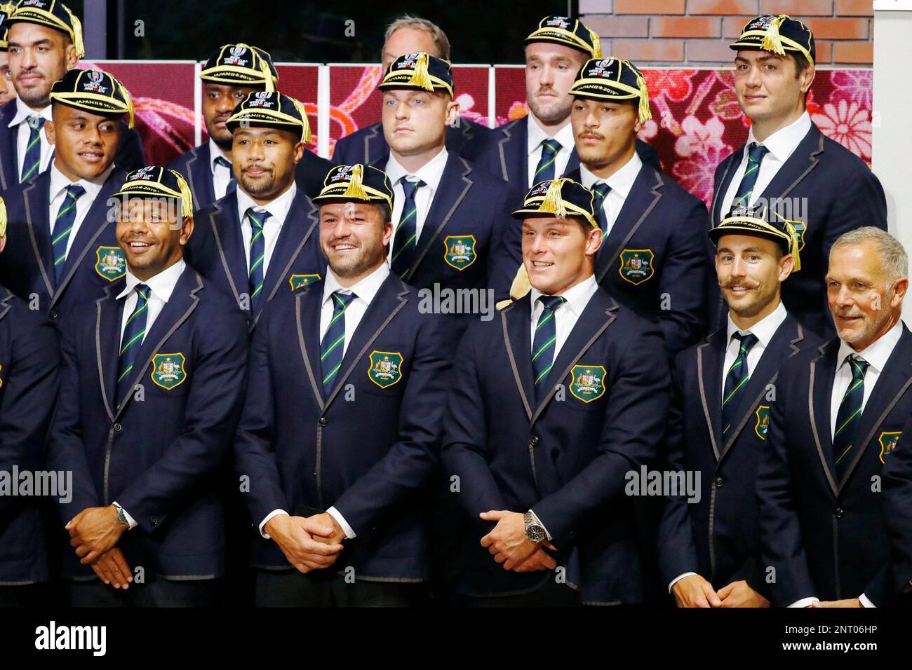 Australian rugby team members pose for a photograph during a welcome ...