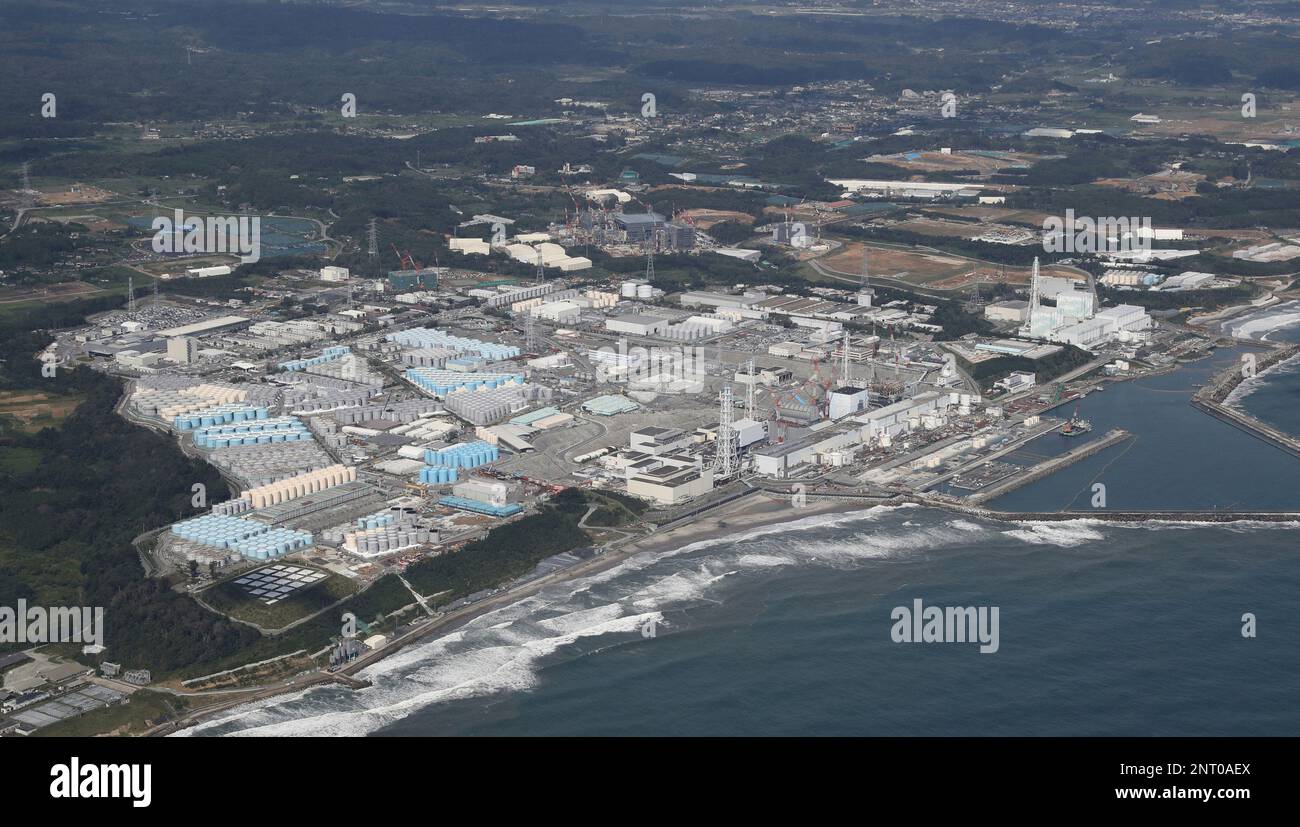 An aerial photo shows the tanks of contaminated water at the Fukushima ...