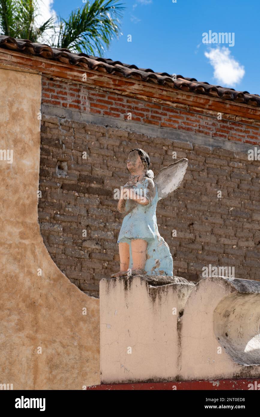 An angel statue on the atrium wall of the Santiago Apostal Church in ...