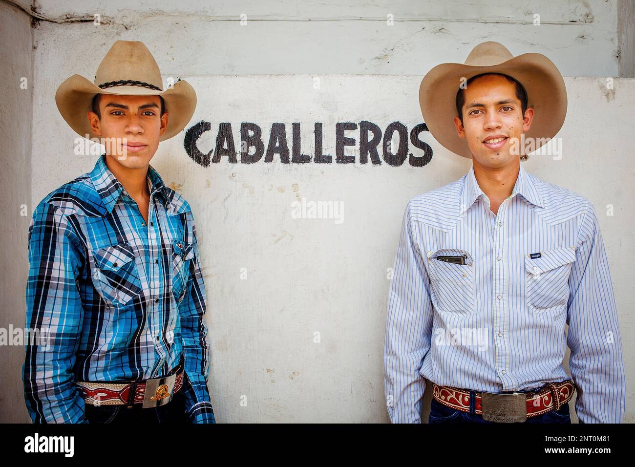 Spectators in a charreada Mexican rodeo at the Lienzo Charro Zermeno ...