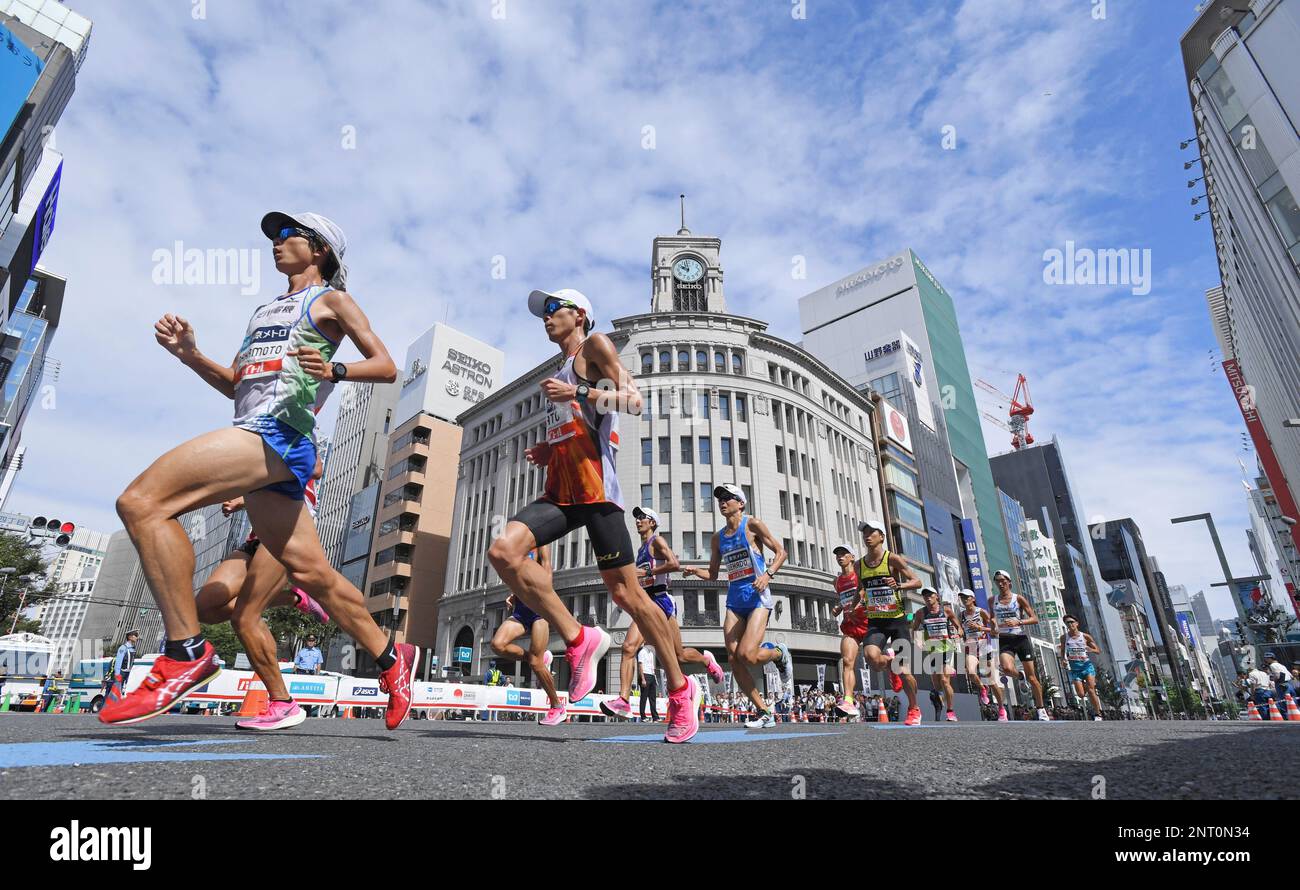 Runners compete during the Marathon Grand Championship in Ginza ...