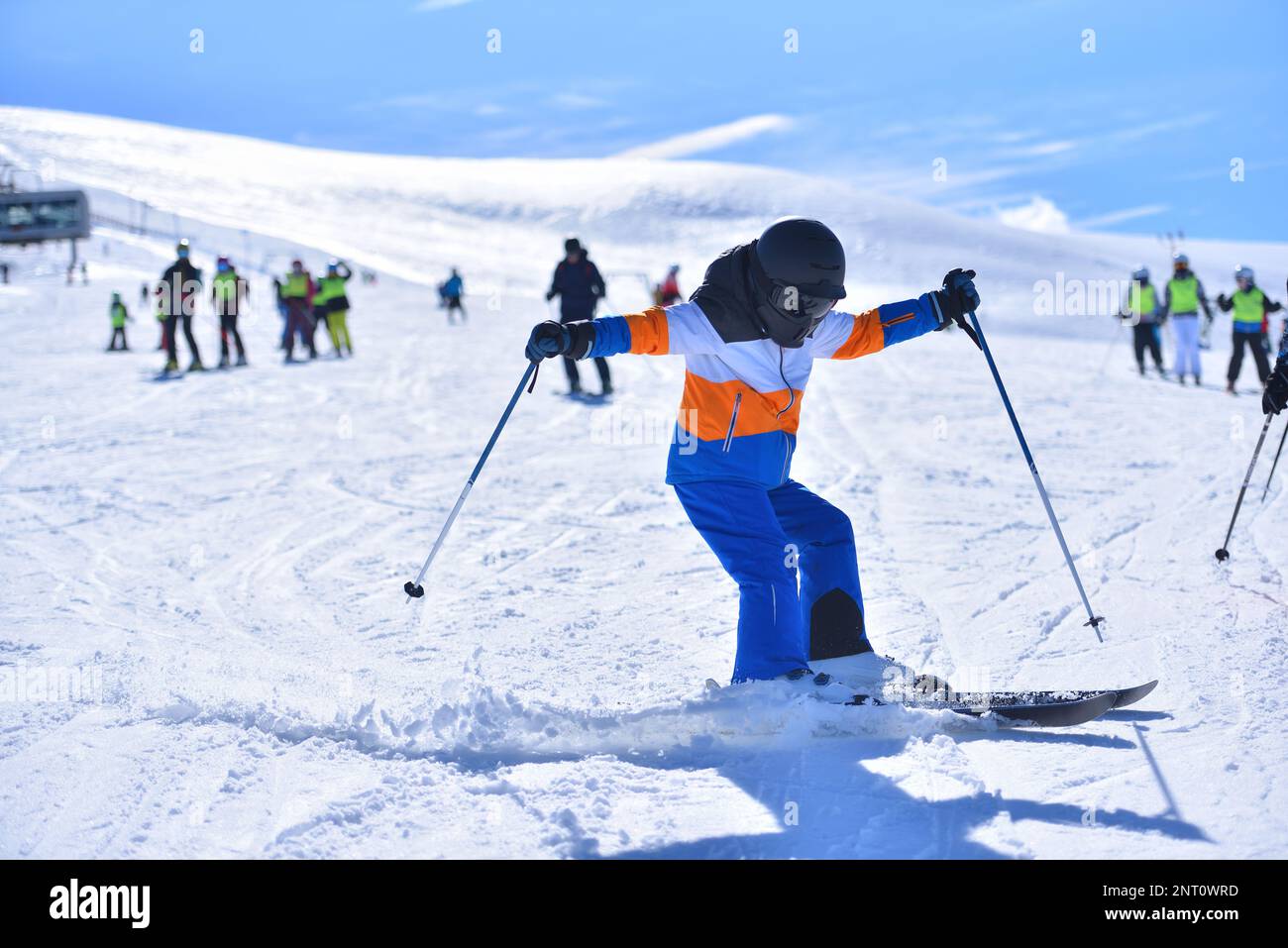 Skiing Technique: A Boy Mastering His Skills with a Quick Stop and a ...