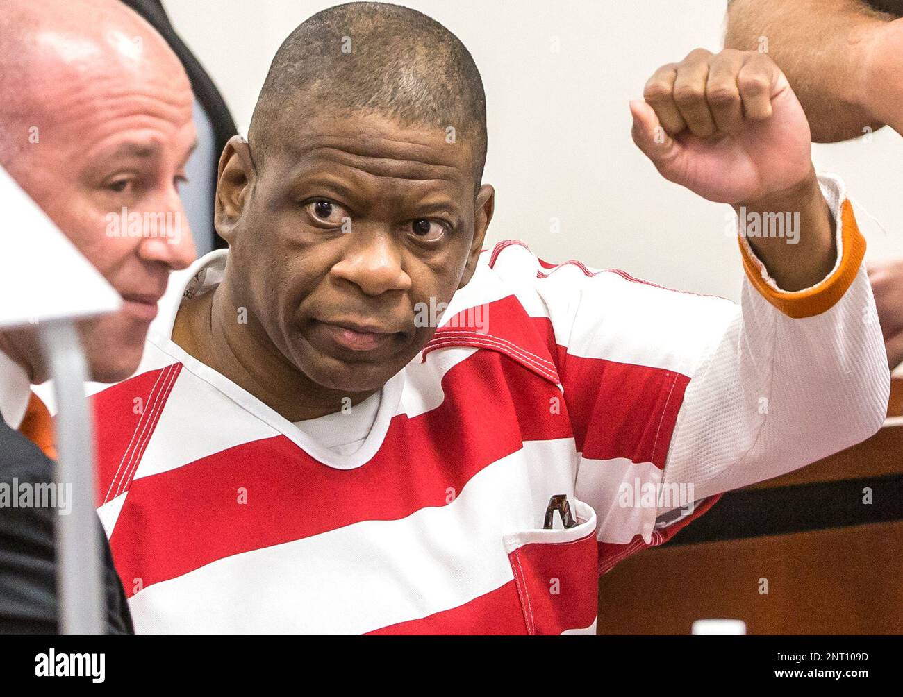 Death Row inmate Rodney Reed waves to his family in the Bastrop County ...