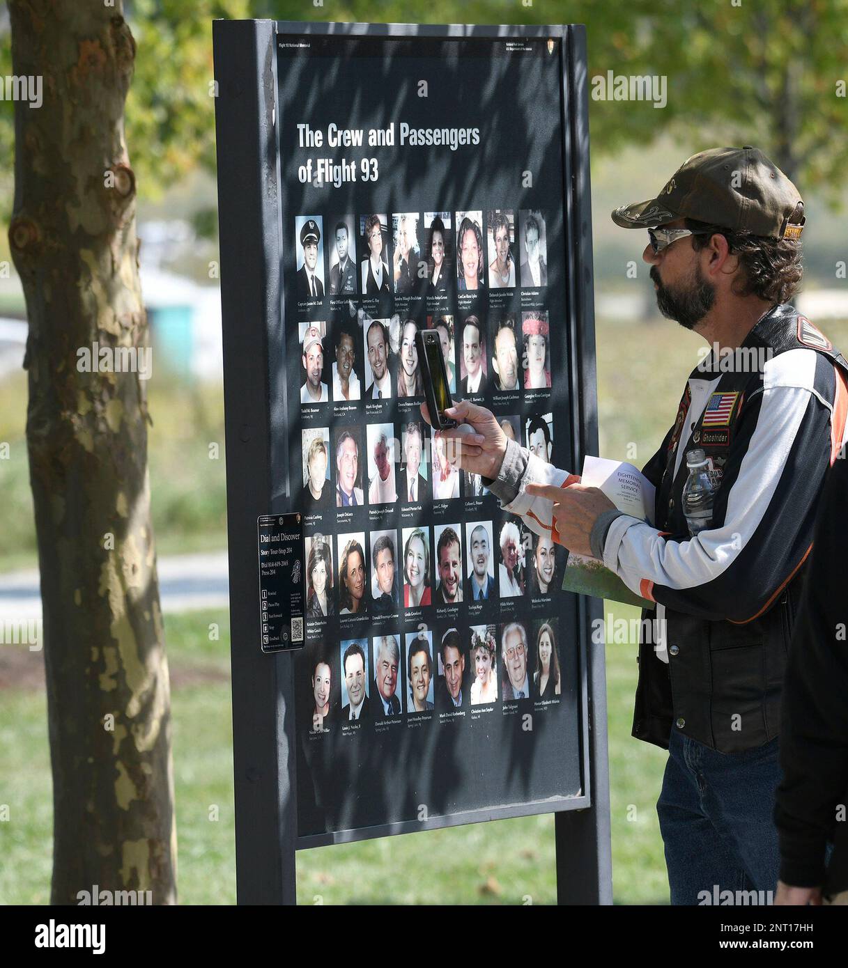 Dion Scallion of New Lenox, Illinois takes a photo of the 40 heroes of ...