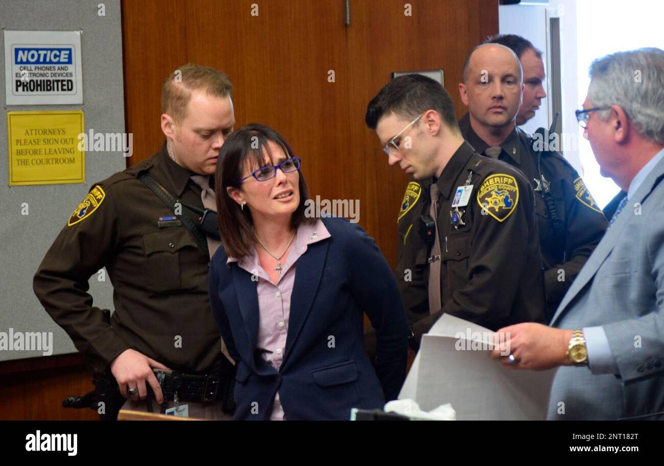 Tina Talbot gives her lawyer Jerome Sabbota a distressed look as ...