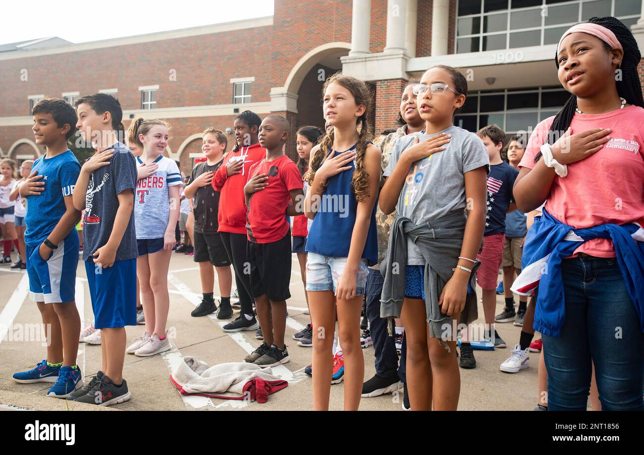 Students say the Pledge of Allegiance during Patriot Day at Jack ...