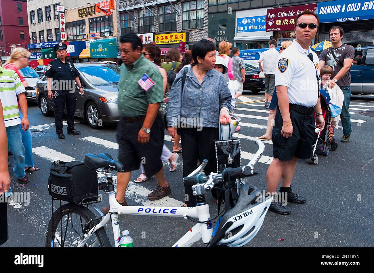 Chinatown.Chinese police in chinatown. Canal St,New York City, USA ...