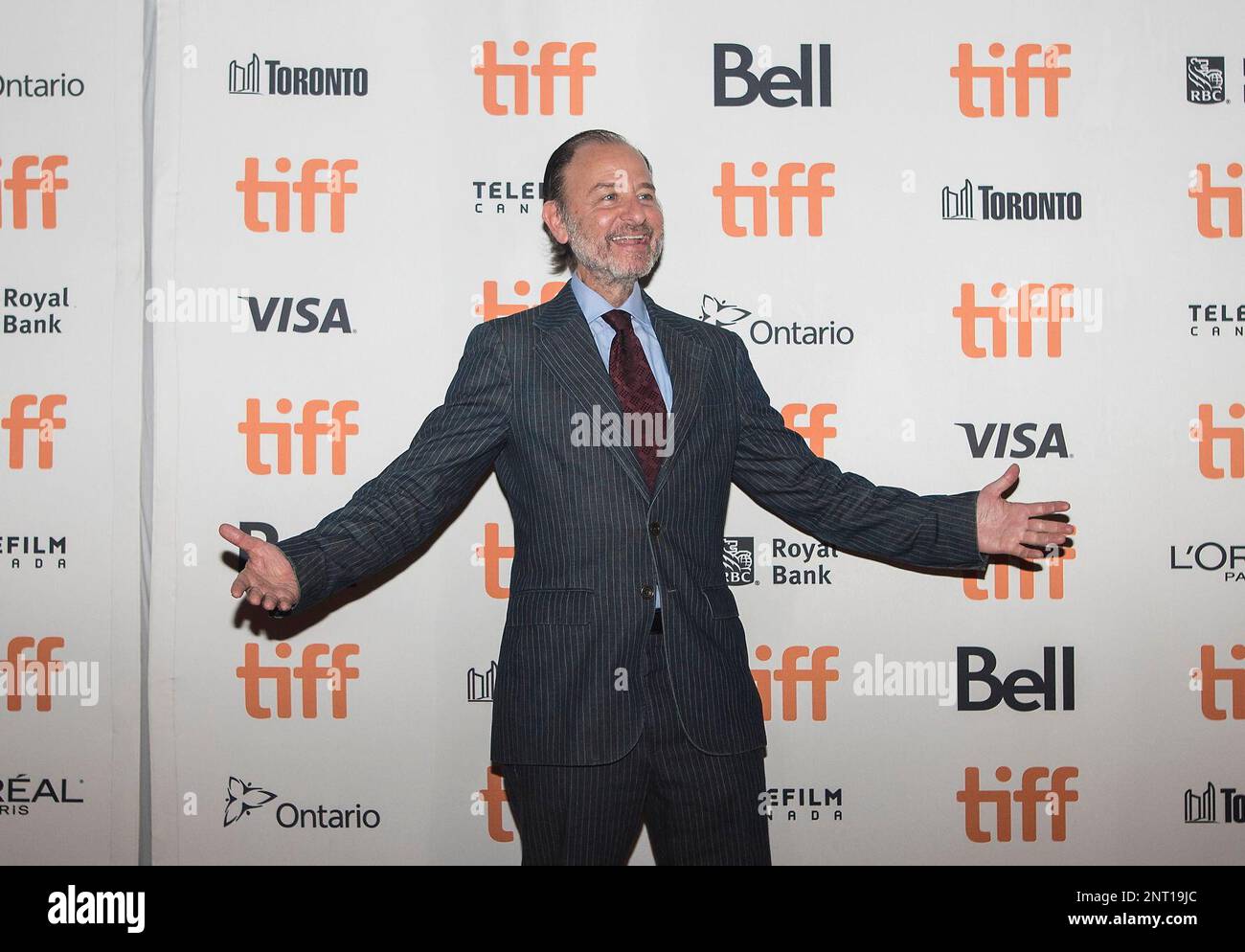 Actor Fisher Stevens poses for a photograph on the red carpet premiere ...