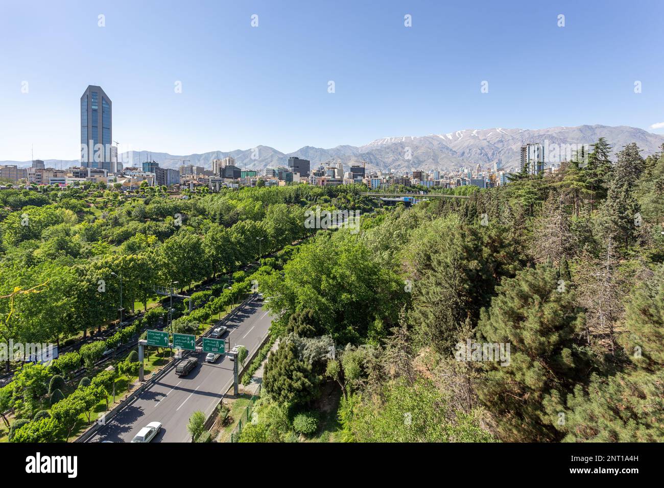 The Alborz mountain range can be seen beyond the skyline of Tehran ...