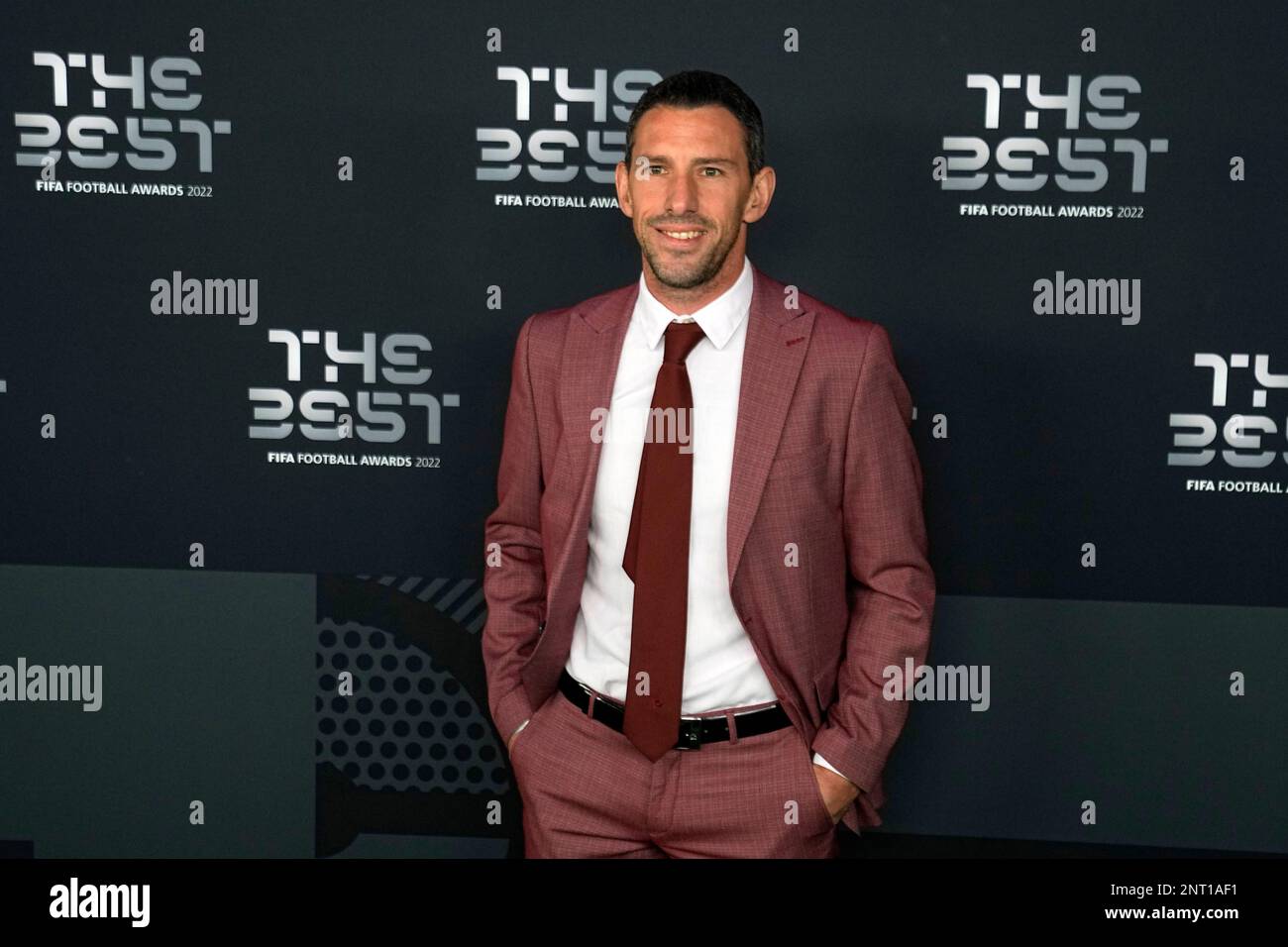 Argentina's former soccer player Maxi Rodriguez poses on the green ...
