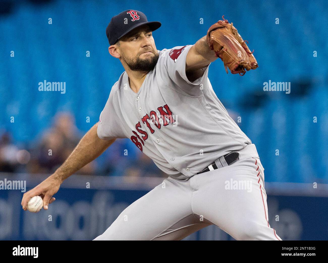 Boston Red Sox starting pitcher Nathan Eovaldi throws to a Toronto Blue ...