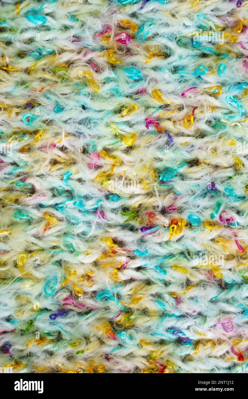 Colorful light hand made crochet or knitting textile fabric texture ...