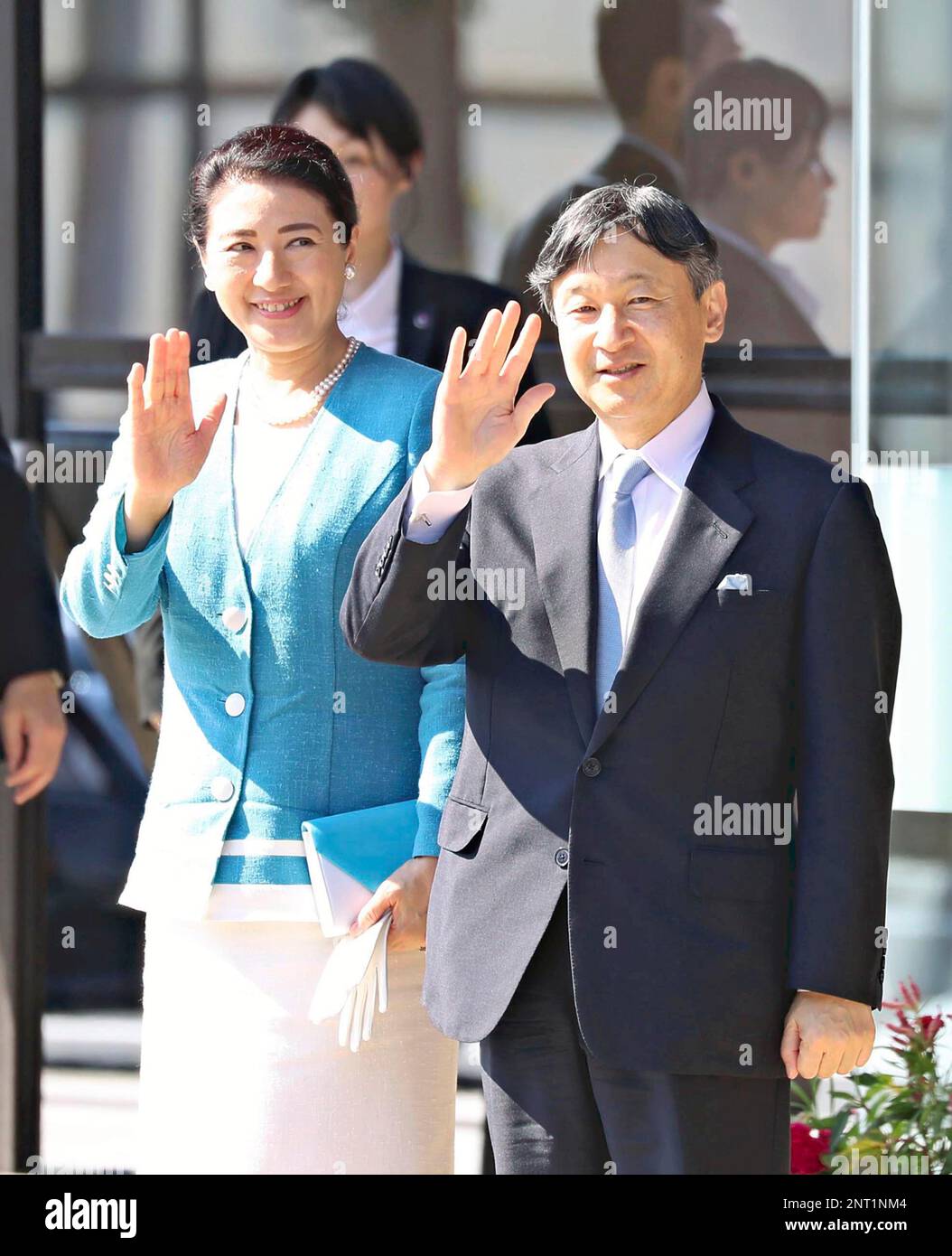 Japan's Emperor Naruhito and Empress Masako wave their hands at Akita ...