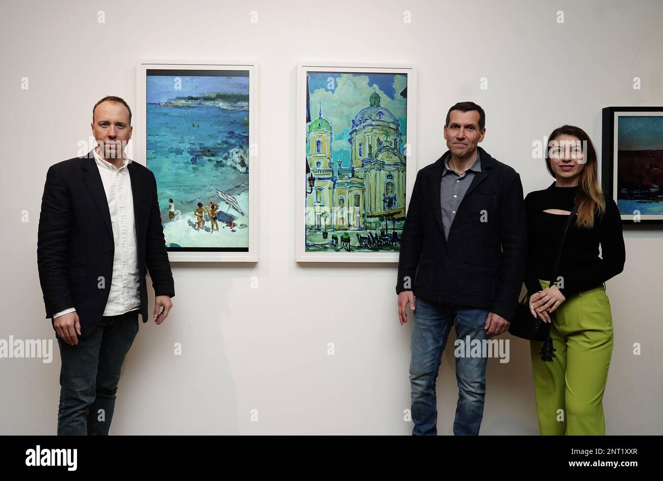 Matt Hancock (left) with Ukrainian Oleg Mishchenko and Iryna Korobkina ...
