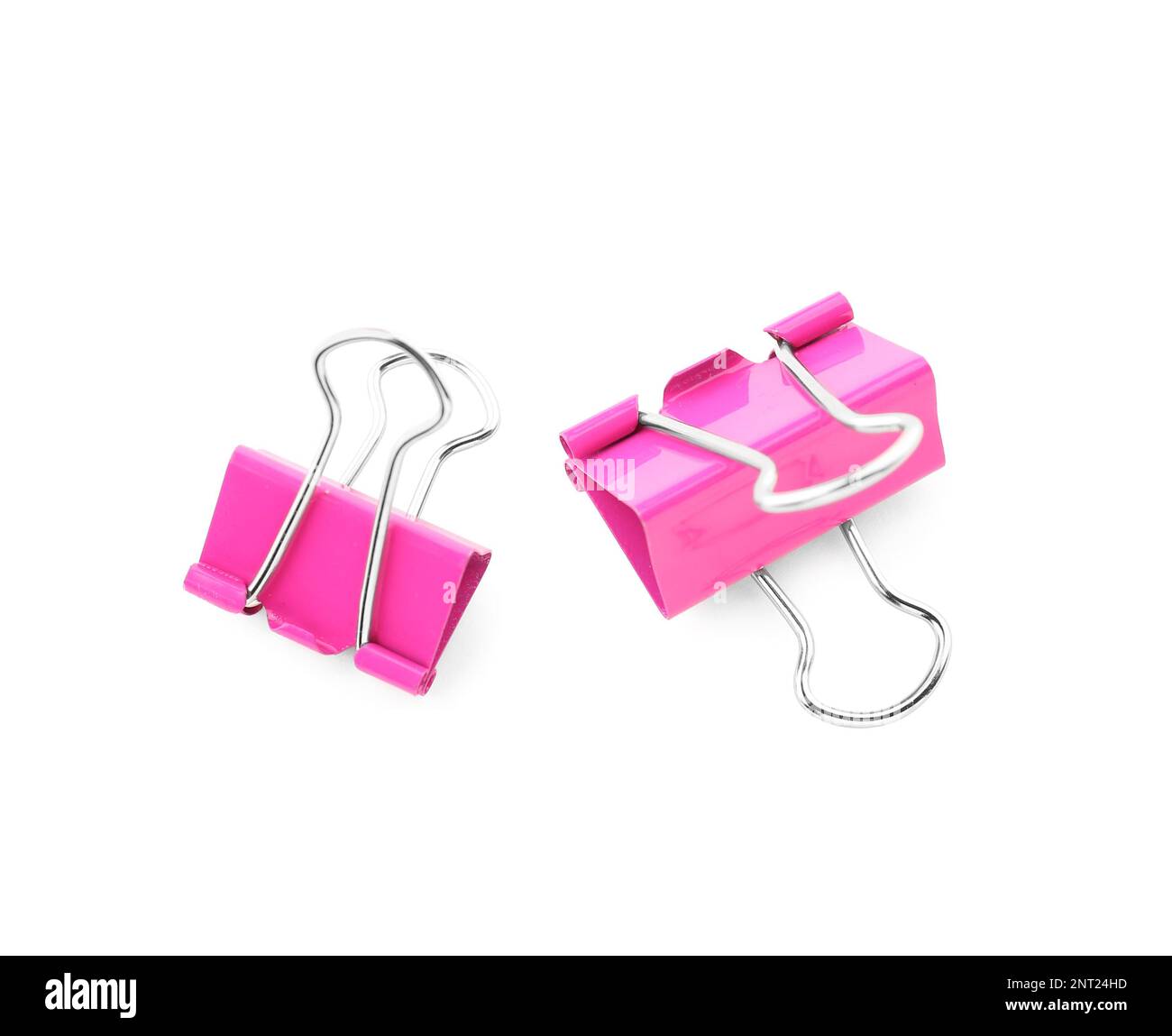 Pink binder clips isolated on white background Stock Photo - Alamy