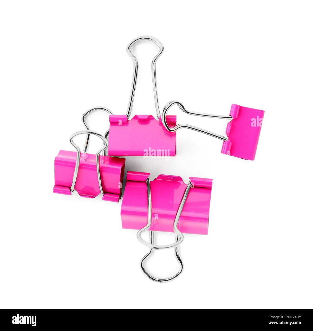 Pink binder clips on white background Stock Photo - Alamy
