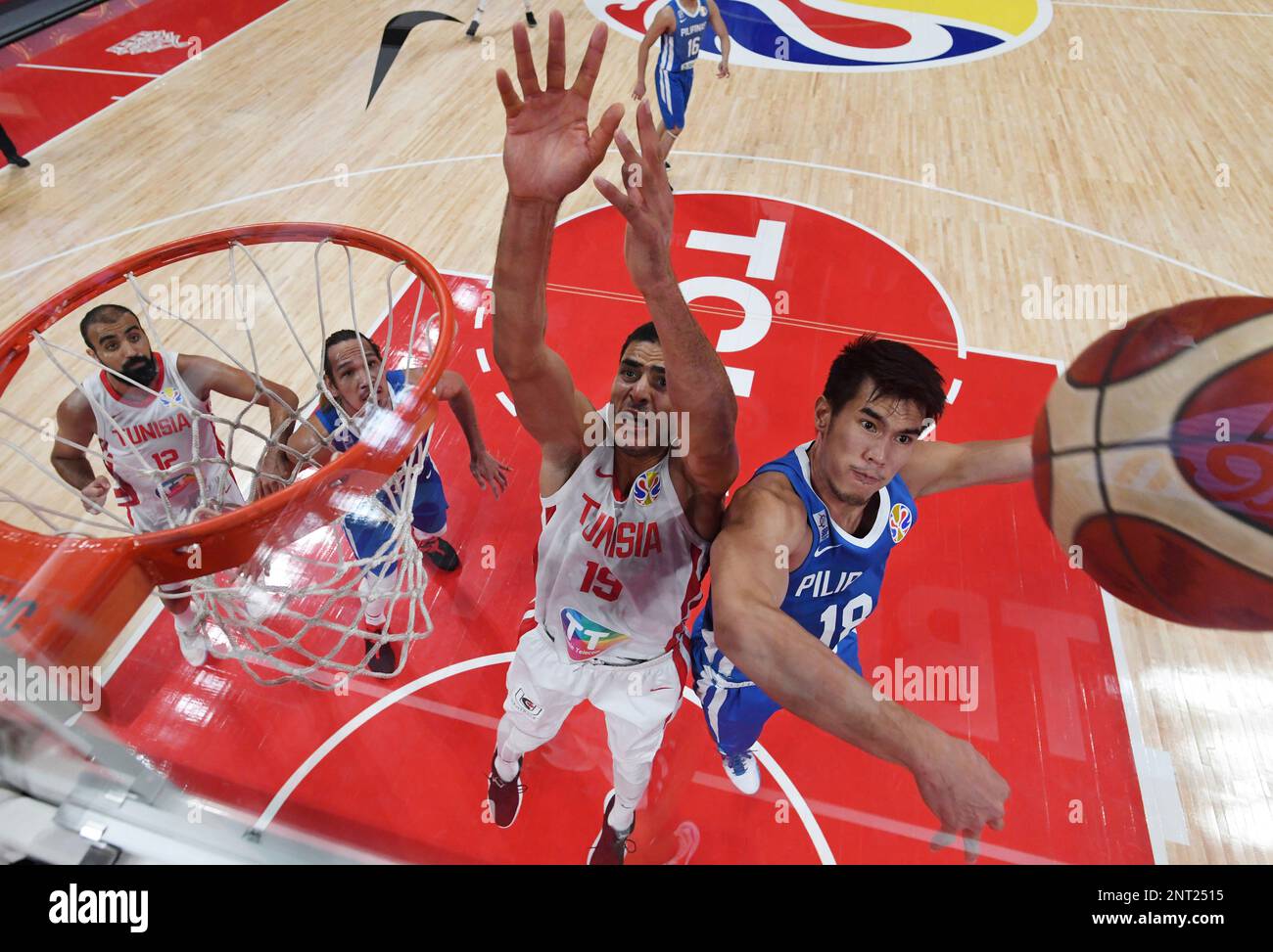 Troy Rosario of the Philippines, right, and Tunisia's Mohamed Abbasi ...