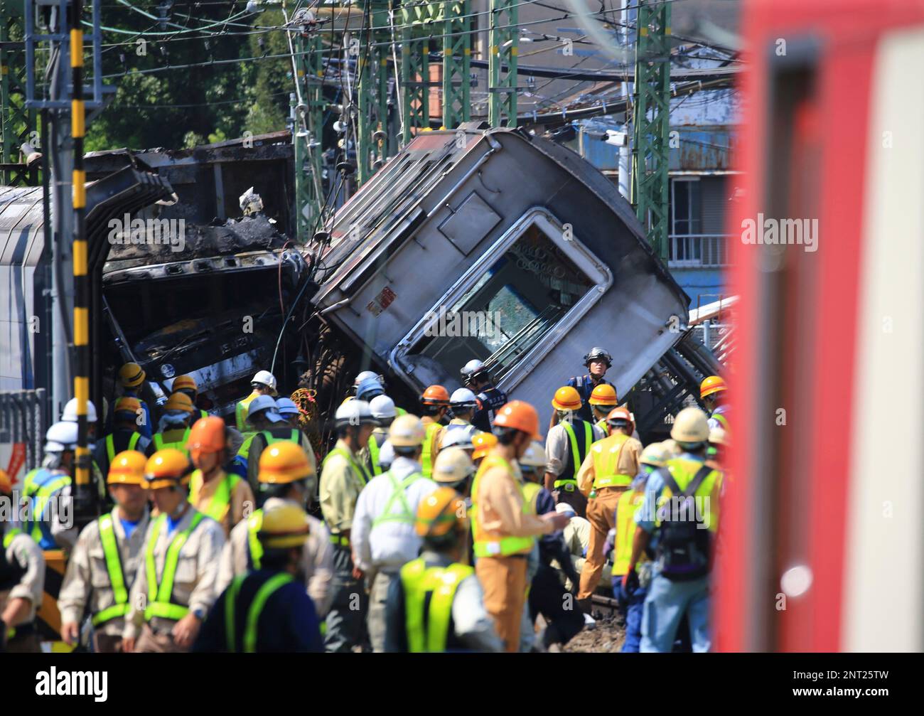 A photo shows a train of Keikyu Line derailed between Kanagawa ...