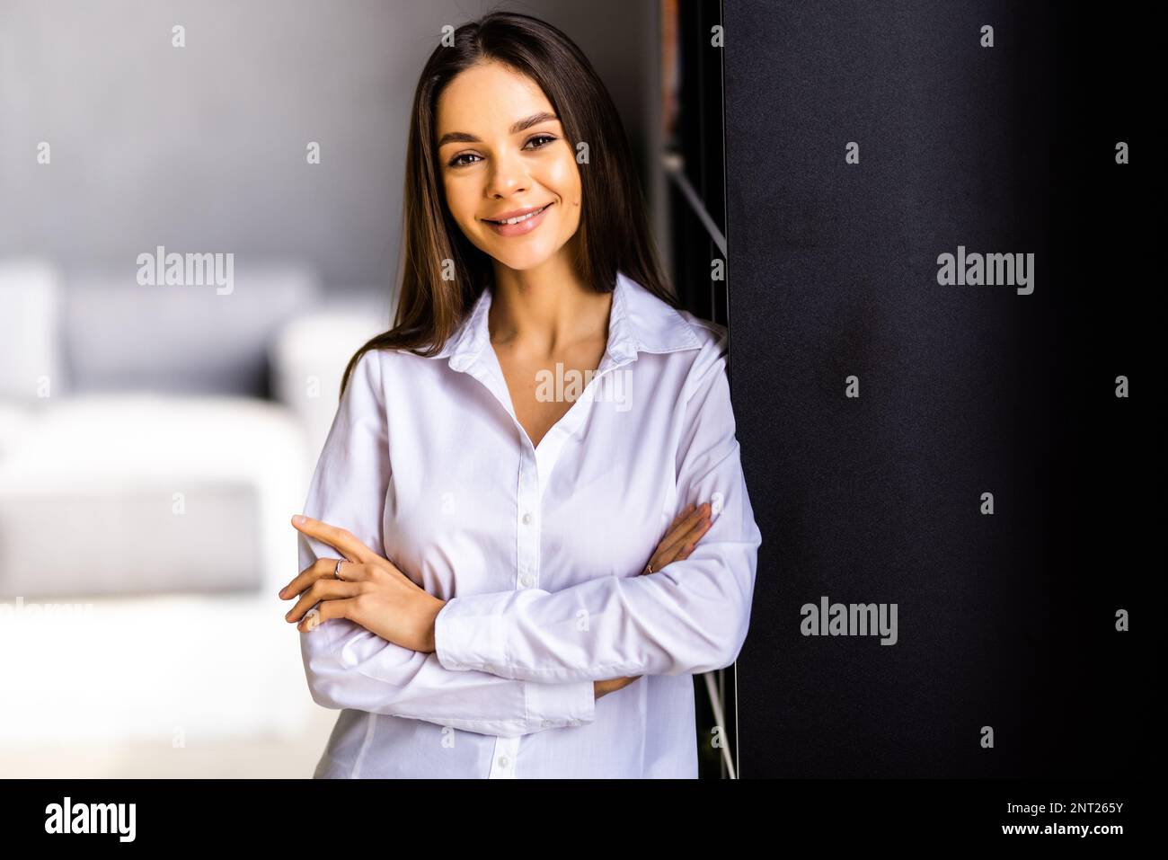 Successful businesswoman sitting desk office arms crossed hi-res stock ...