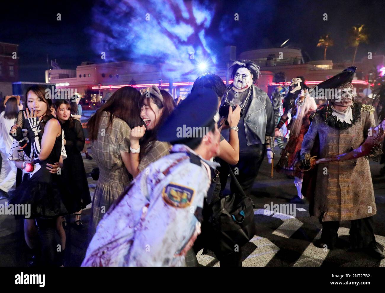 Visitors dance with zombies and monsters during the Halloween Horror ...