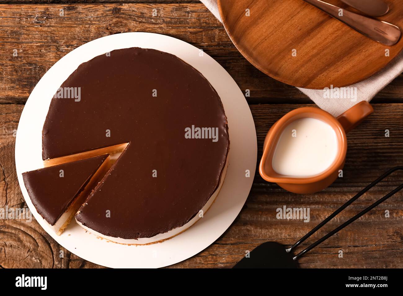 Delicious birds milk cake on wooden background Stock Photo - Alamy
