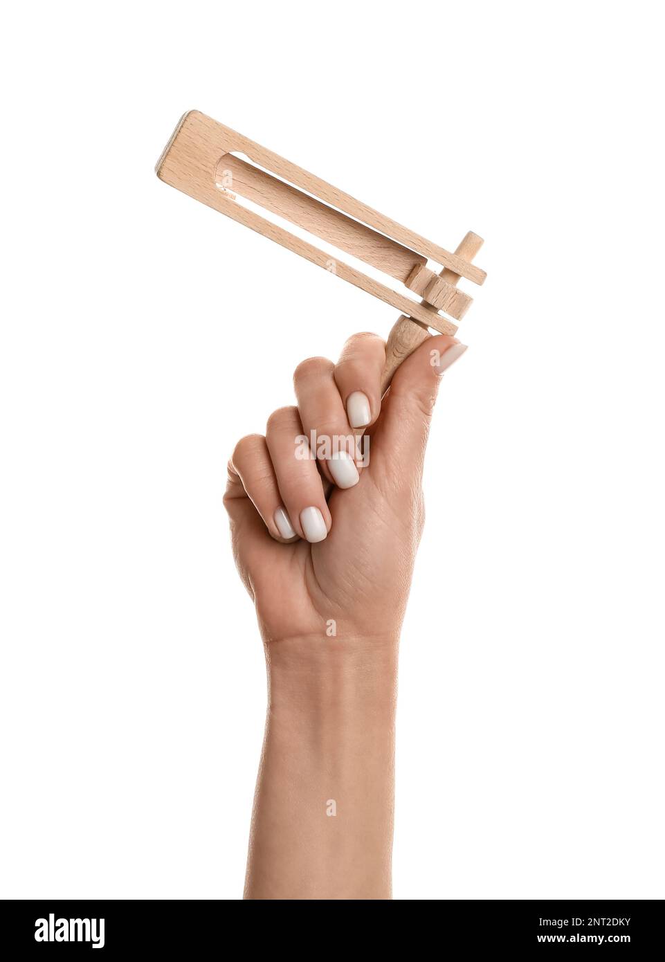 Woman with Jewish rattle for Purim holiday on white background Stock ...