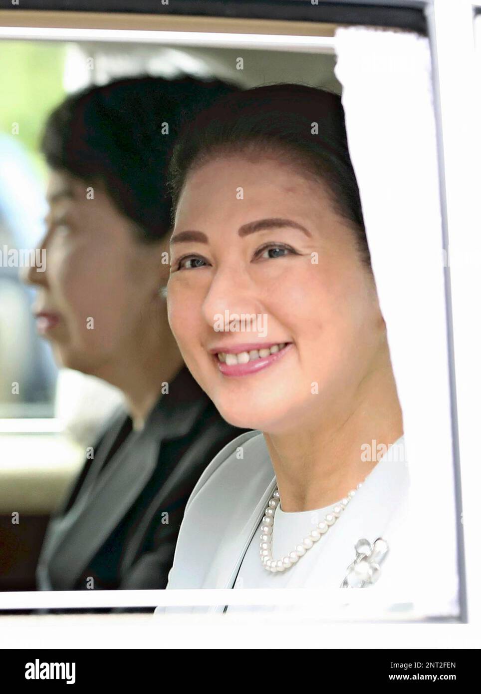 Japan's Empress Masako arrives at the Imperial Palace in Tokyo o Sep.4 ...
