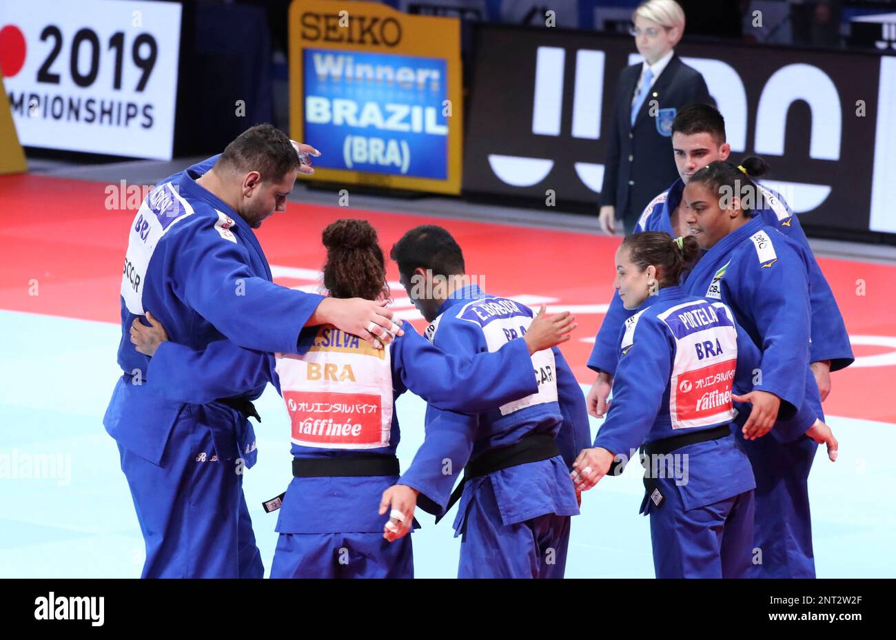 Members of Brazil celebrate after winning the teams bronze match of ...