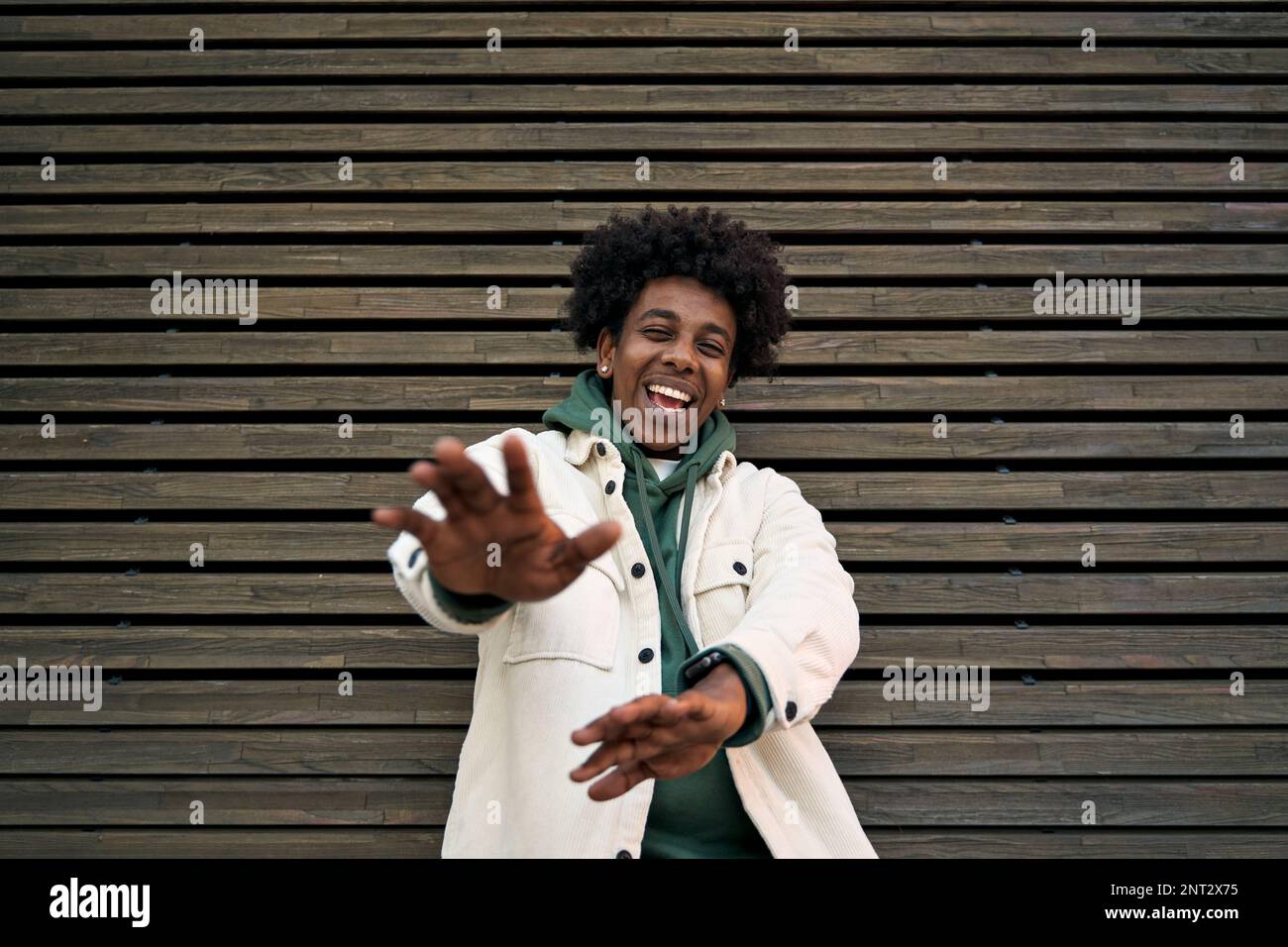 Happy funny gen z hipster rapper African American guy dancing and ...