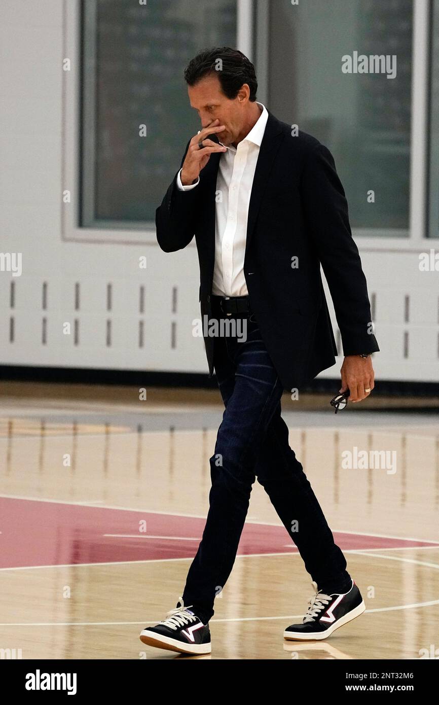 Newly hired Atlanta Hawks NBA basketball coach Quin Snyder walks across ...