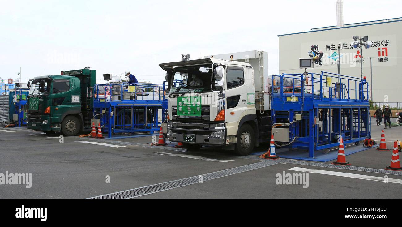 Vehicles to carry removed soil is seen at the interim nuclear waste ...