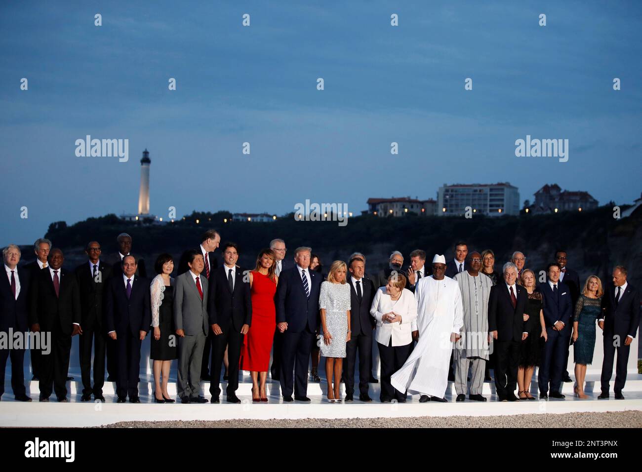 Group of Seven leader and guests pose for the G7 family photo Sunday ...