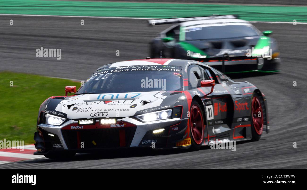 A driver of Japan's Audi Team Hitotsuyama steers an Audi R8 LMS GTR3 ...