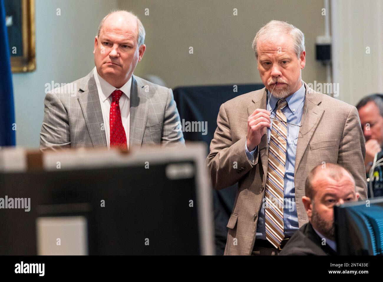 Defense attorney Jim Griffin and prosecutor Creighton Waters listen to ...