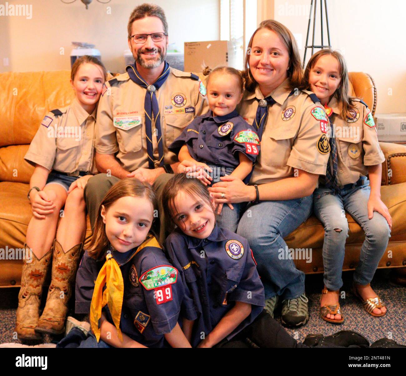 Robert and Kristin Warden, center, and their daughters, from left ...