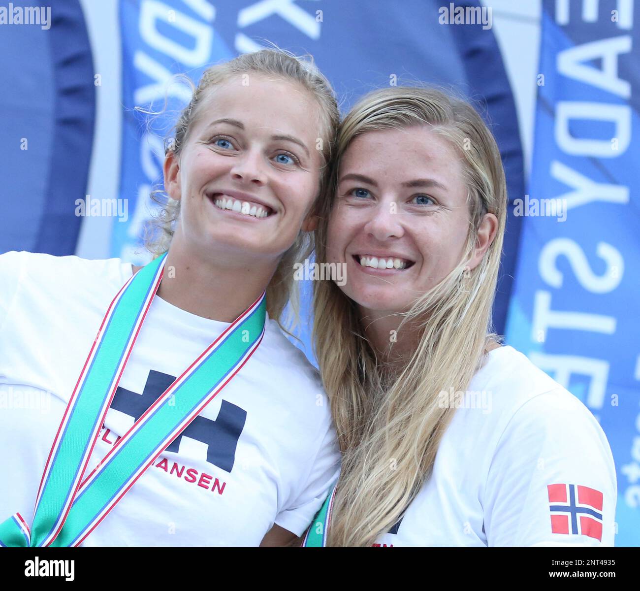 Helene Naess and Marie Ronningen of Norway celebrate during an awarding ...