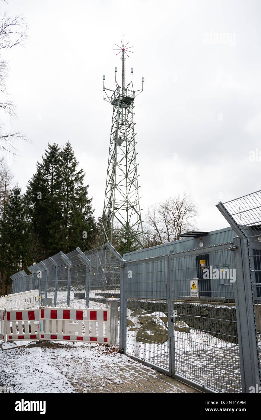 Industrial Building with fence and radar Tower with different measuring ...