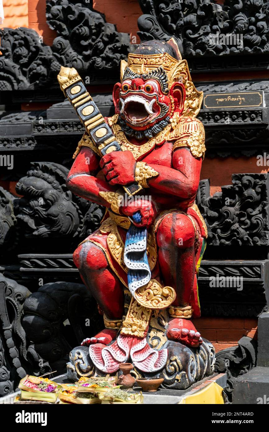 Stone colorful statues at the temple's entrance in Nusa Dua, Bali ...