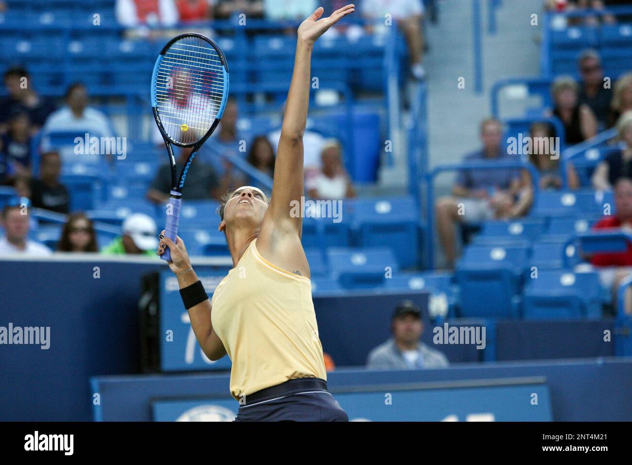 Madison Keys (USA) serves to Venus Williams (USA) during the Western ...