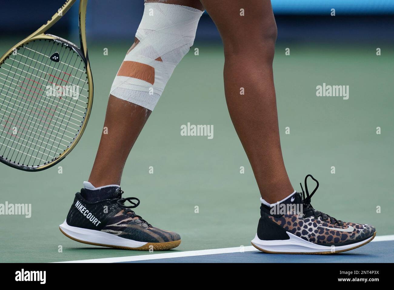 CINCINNATI, OH - AUGUST 16: Naomi Osaka (JPN) has her leg taped during ...
