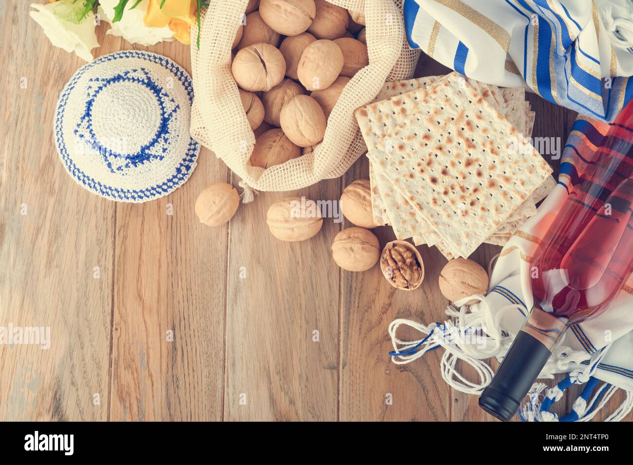 Passover celebration concept. Matzah, red kosher and walnut ...
