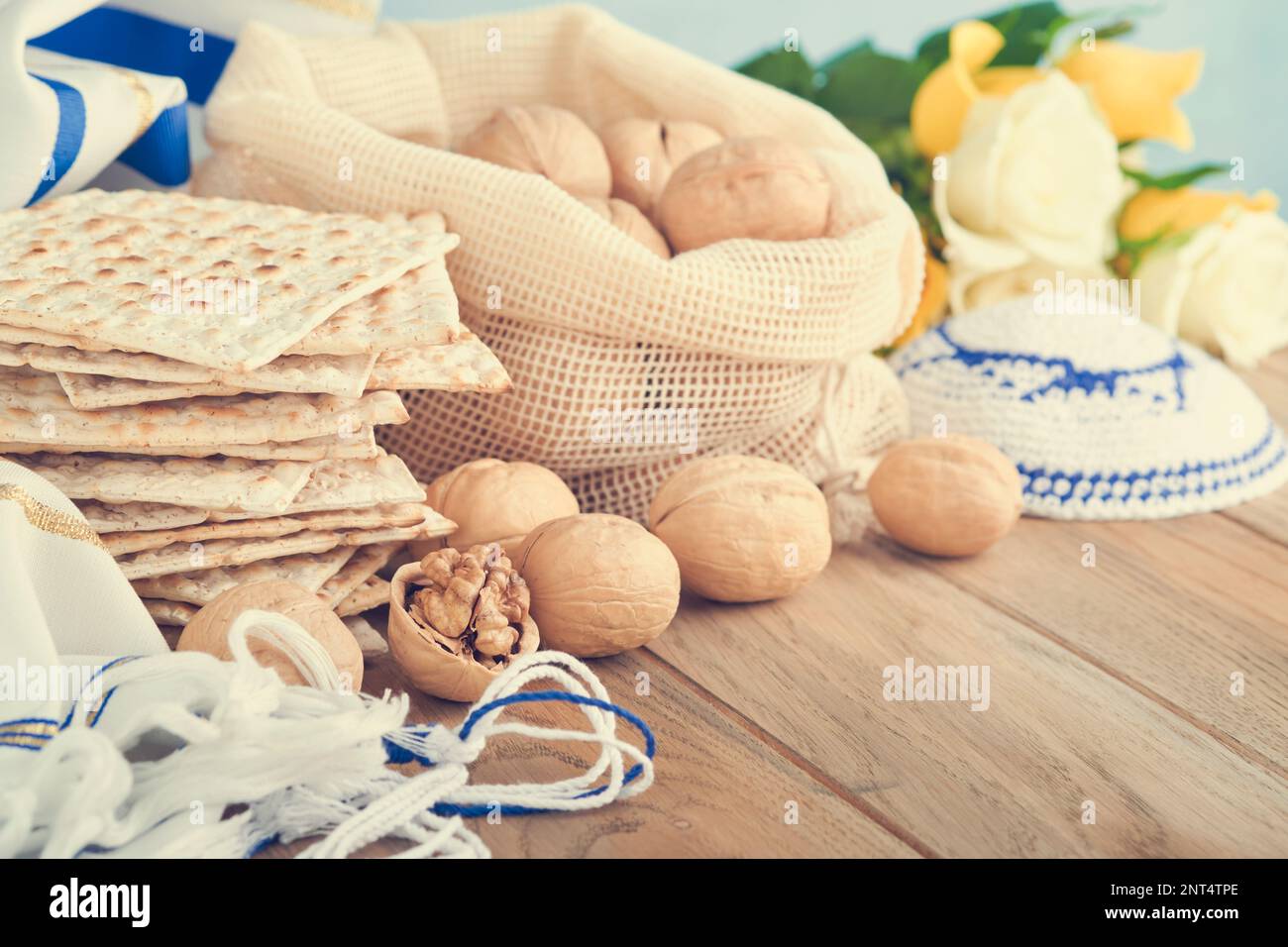 Passover celebration concept. Matzah, red kosher and walnut ...