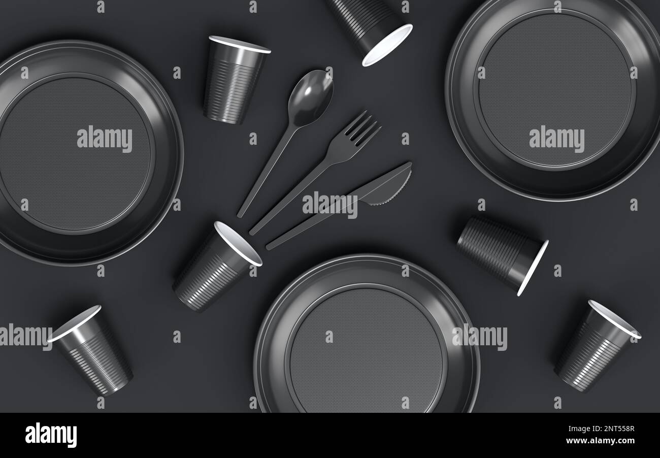 Set of disposable utensils like plate, folk, spoon and cup on ...