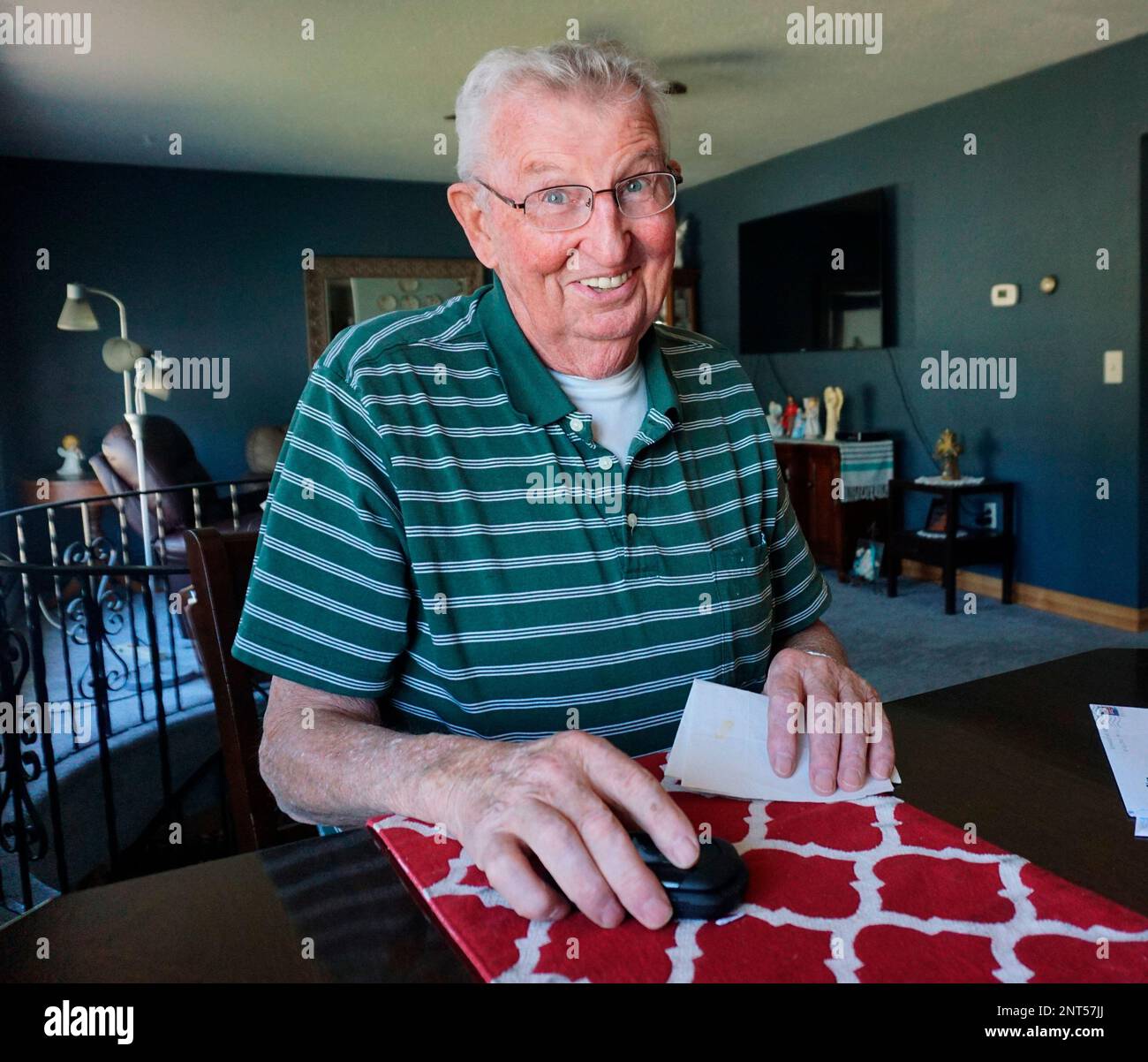 In this July 29, 2019, photo, Joe Goldade poses for a photo at his home ...