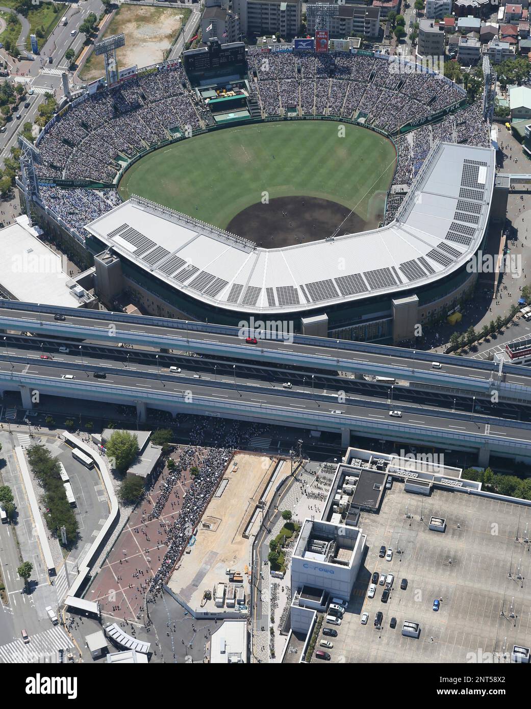 An aerial photo shows full of spectators at Hanshin Koshien Stadium ...