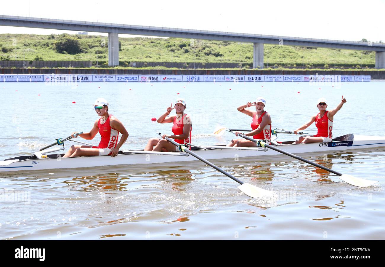 Chinese team members react after winning the Junior Women's Four in ...