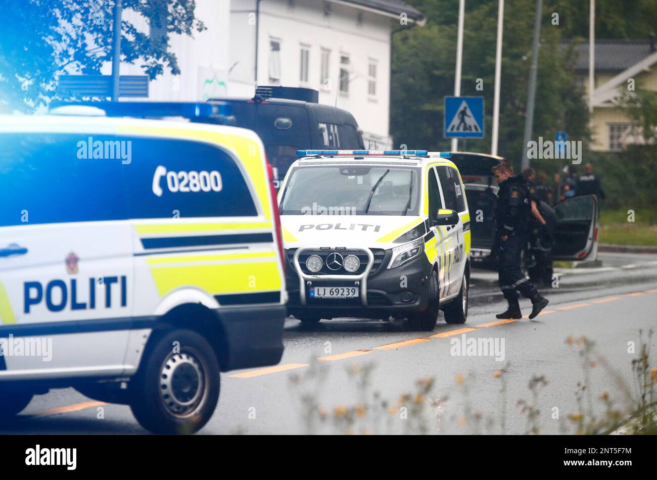 Police attend the scene after a shooting inside the al-Noor Islamic ...