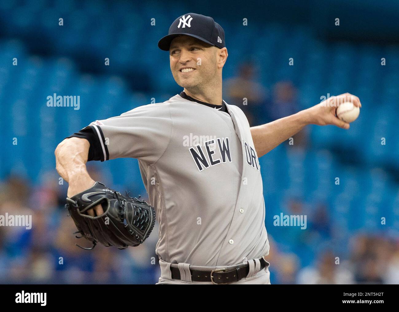 New York Yankees starting pitcher J.A. Happ throws against the Toronto ...