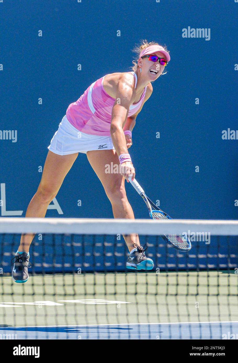 SAN JOSE, CA - AUGUST 04: Nicole Melichar (USA) goes up on a serve ...