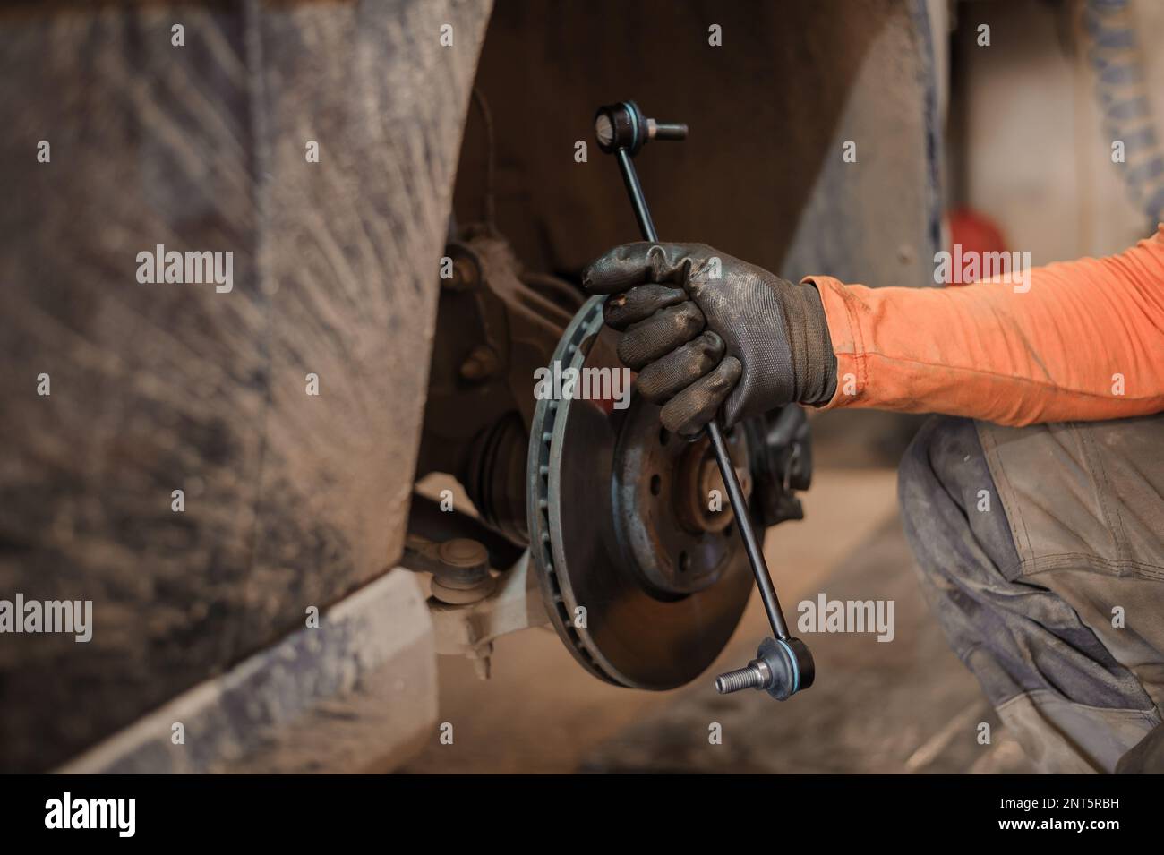 Replacement and repair of wheels and shock absorbers on a car Stock ...